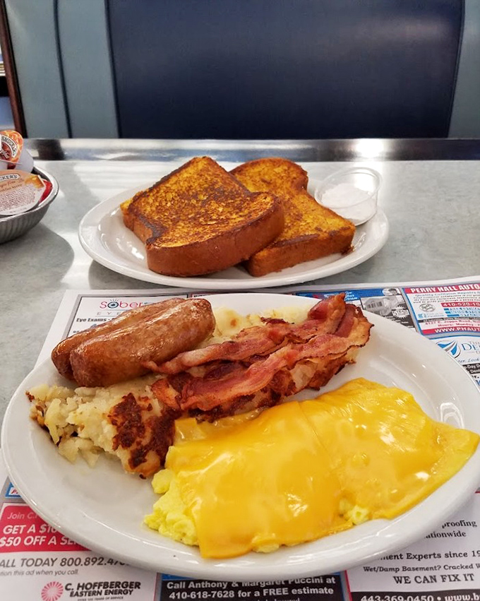 This omelet doesn't just contain ham &ndash; it embraces it, along with a blanket of melted cheese and home fries that deserve their own fan club. 