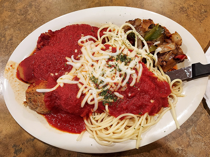 Italian grandmothers everywhere would nod approvingly at this veal parmesan. The sauce-to-cheese ratio achieves what diplomats can only dream of: perfect harmony.