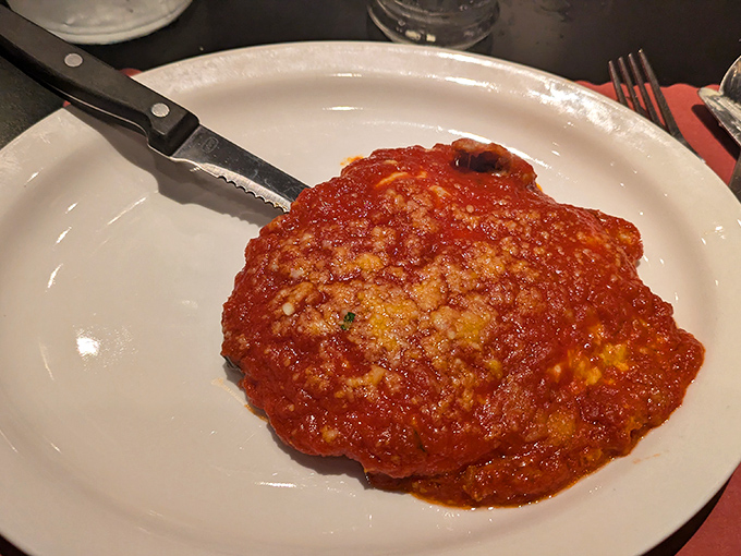 This veal parmigiana isn't just dinner, it's a warm Italian hug on a plate. The sauce-to-cheese ratio? Perfection that would make nonna weep with joy.