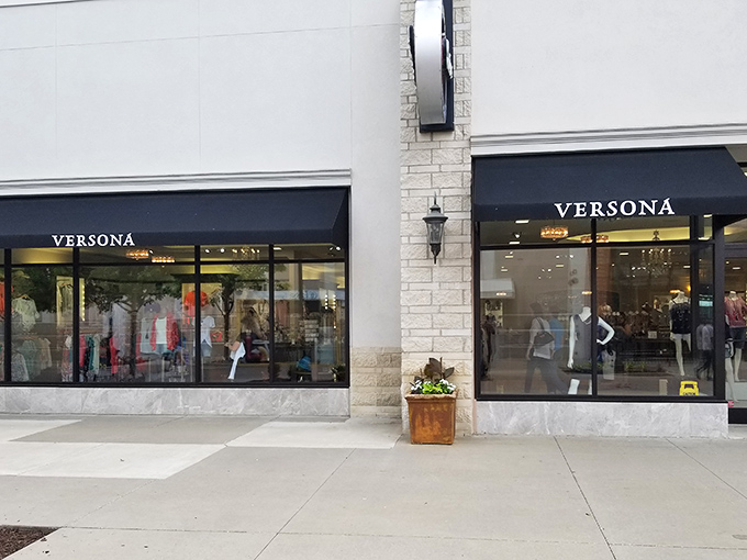 Versona's elegant storefront promises a treasure trove of accessories inside. Like a jewelry box expanded to store size, it beckons with window displays of possibility.