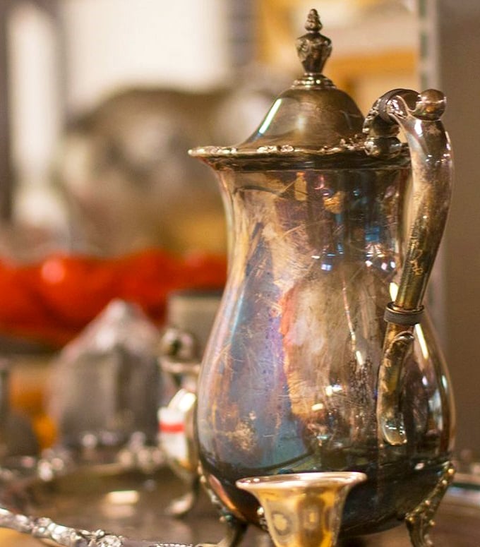 This silver teapot has poured for generations, its tarnished elegance hinting at Sunday afternoons and conversations long forgotten.