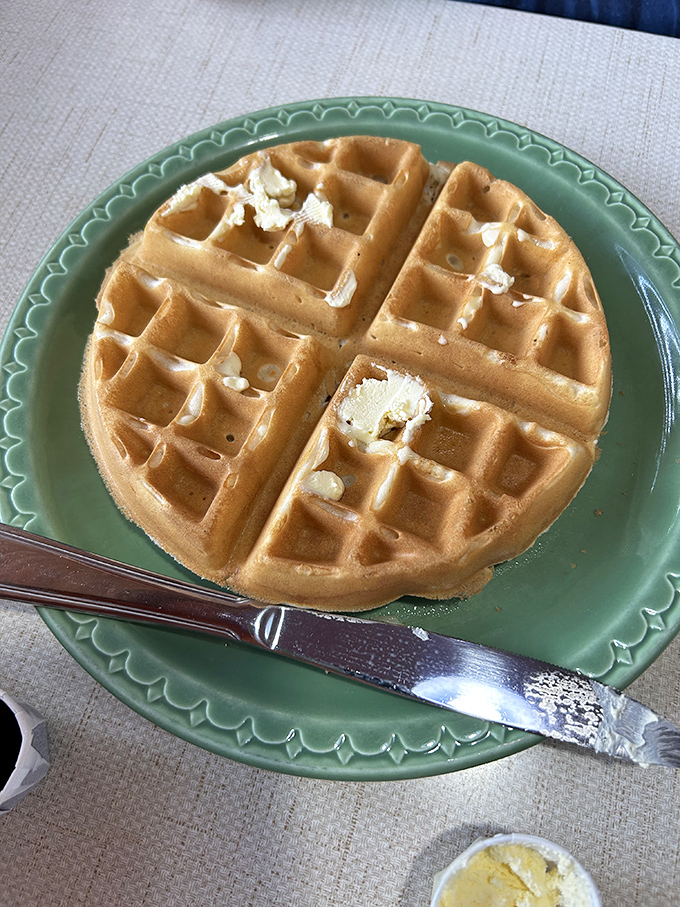 This Belgian waffle isn't trying to impress anyone with unnecessary frills, yet somehow manages to be the breakfast equivalent of a perfect symphony.