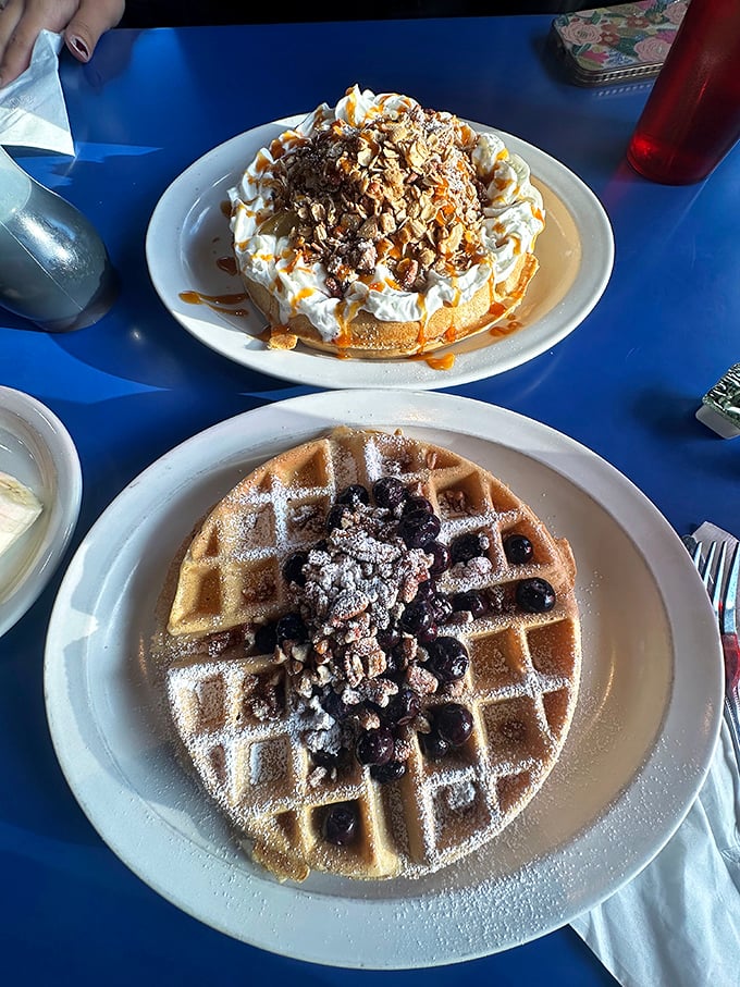 Waffle perfection exists! Golden, crispy exteriors give way to fluffy interiors, topped with enough blueberries to count as a serving of fruit.