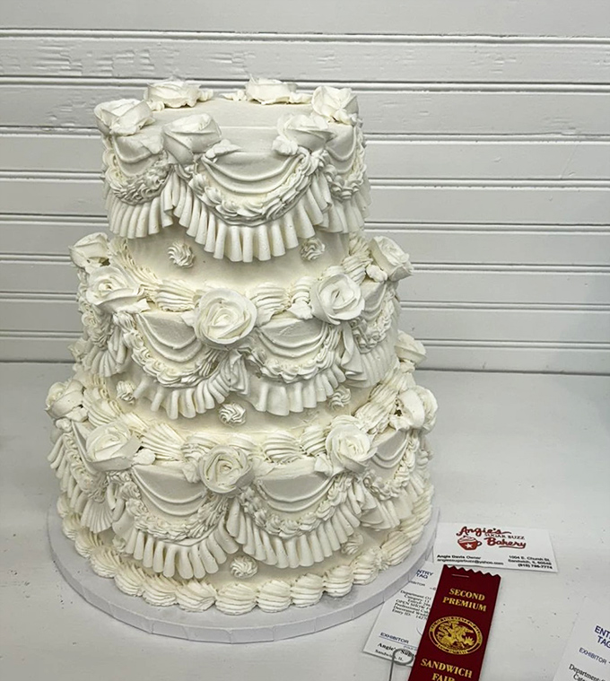 Wedding cake or edible architecture? This white masterpiece won awards at the Sandwich Fair, proving matrimony should always involve buttercream.