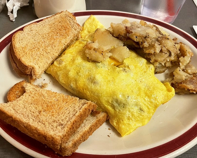 This omelet doesn't just contain ingredients&mdash;it showcases them, with hash browns crisped to that perfect golden-brown sweet spot.