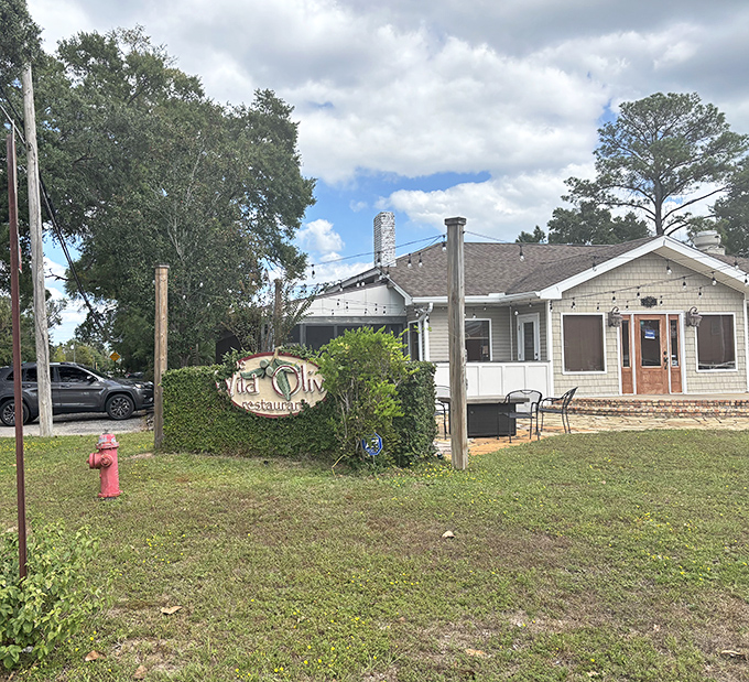 Villa Oliva sits unassumingly in its cozy cottage, proof that Florida's best Italian food often hides in the most unassuming packages.