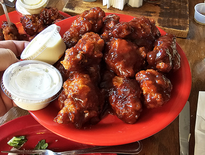 These aren't just wings&mdash;they're sticky, glossy flavor bombs that demand you abandon dignity and embrace the napkin. Worth every messy finger.