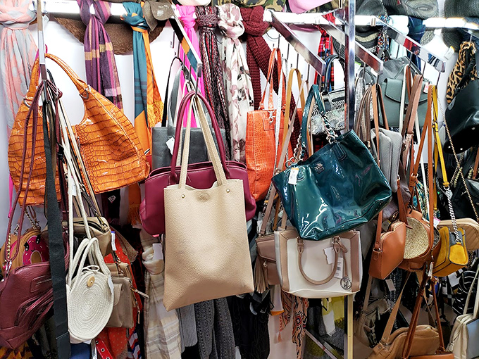 Handbag heaven! A colorful cascade of leather, canvas, and designer labels that would make any accessory enthusiast weak at the knees.