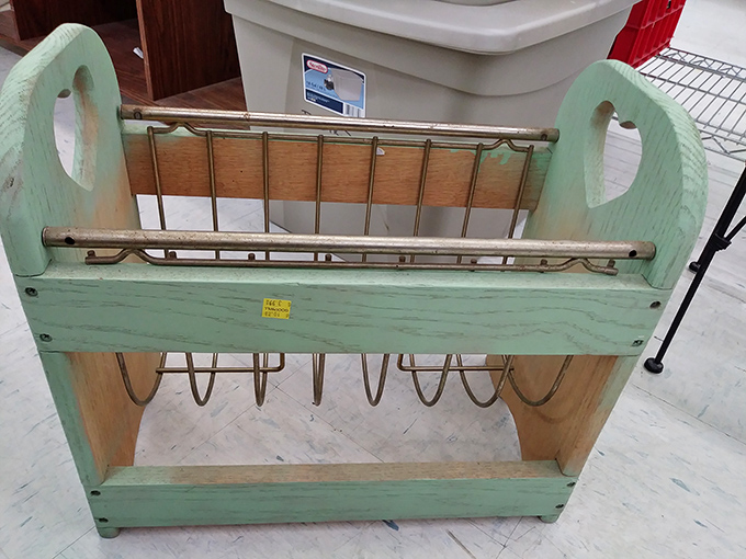 Mint-green vintage charm in wood and metal. This piece could transform from storage solution to Pinterest-worthy display with just a little imagination.