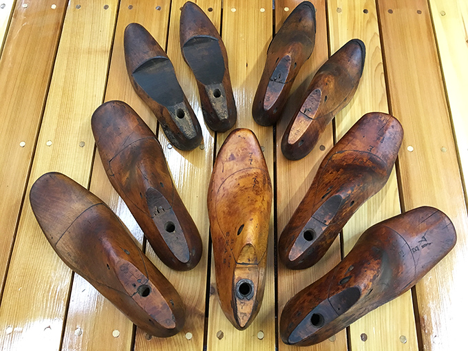 Antique wooden shoe forms that once shaped footwear for folks who walked everywhere uphill both ways.