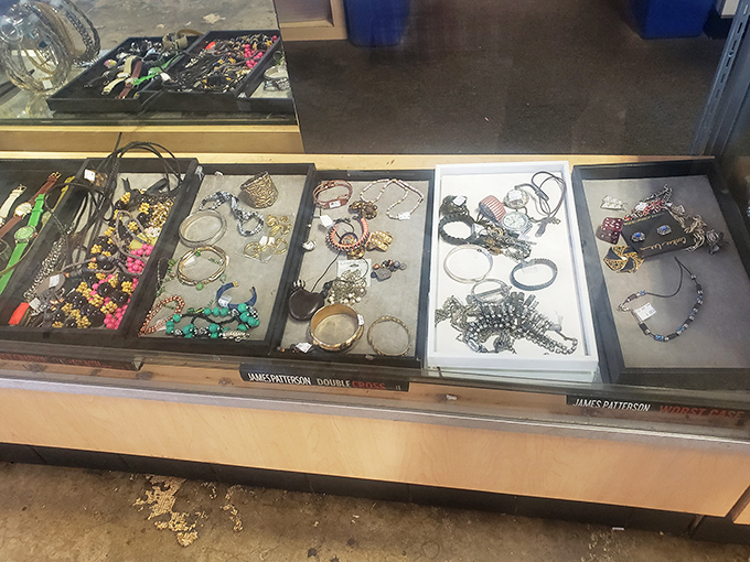 The jewelry counter gleams with potential statement pieces, each tray a treasure map to accessories that could complete your perfect outfit.