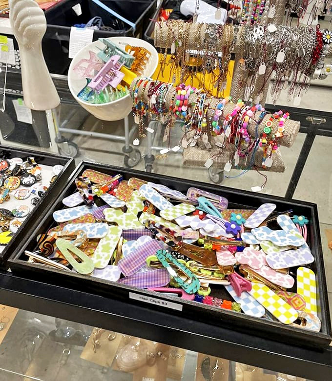 Jewelry hunters, rejoice! This accessories display is like a treasure chest where someone else's forgotten baubles become your new conversation starters.