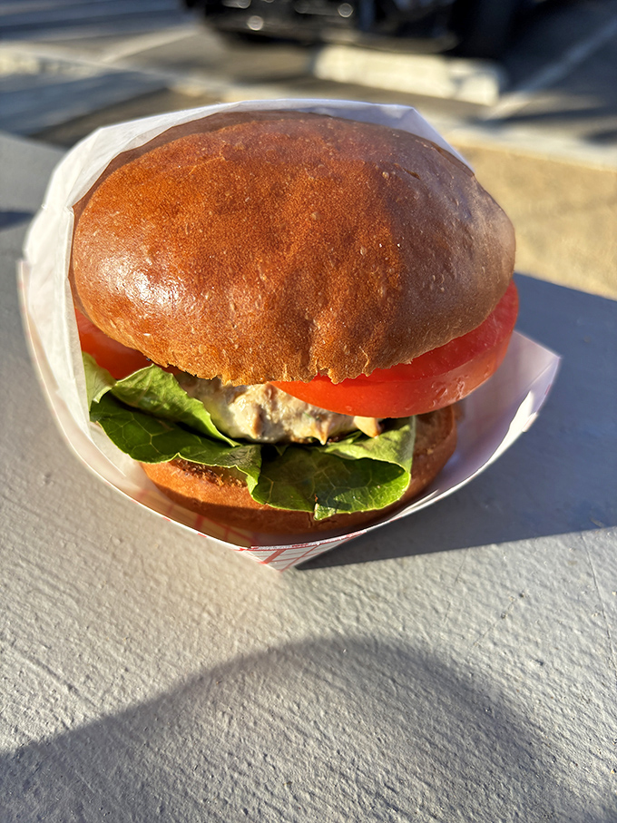 The ahi tuna burger &ndash; where healthy eating meets hedonism. Fresh fish, crisp veggies, and a pillowy bun create the perfect oceanside handheld.