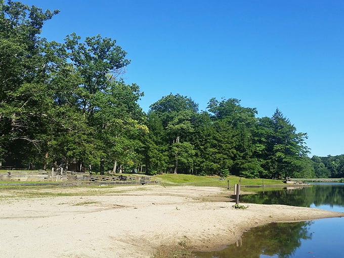 These stone formations by the water look like nature's living room furniture, minus the questionable upholstery choices.