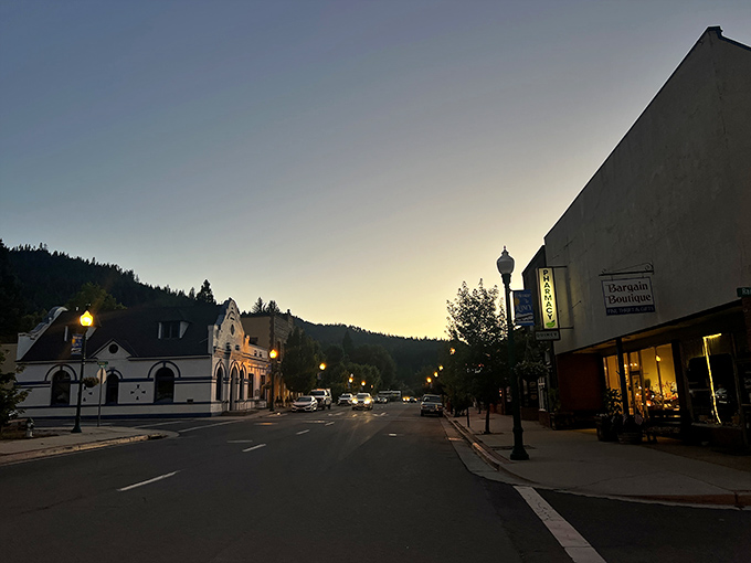 Downtown Quincy at dusk&mdash;when the street lamps flicker on and the Sierra silhouette reminds you you're not in Kansas anymore.