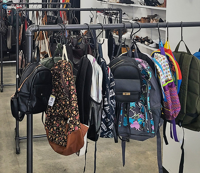 Backpacks hanging like a colorful brigade ready to march into their next adventure with new owners.