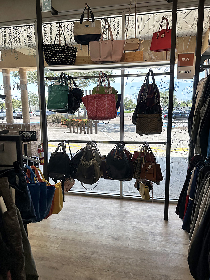 Handbag heaven for the label-conscious bargain hunter. Designer purses hang like fashion fruit, ripe for the picking.