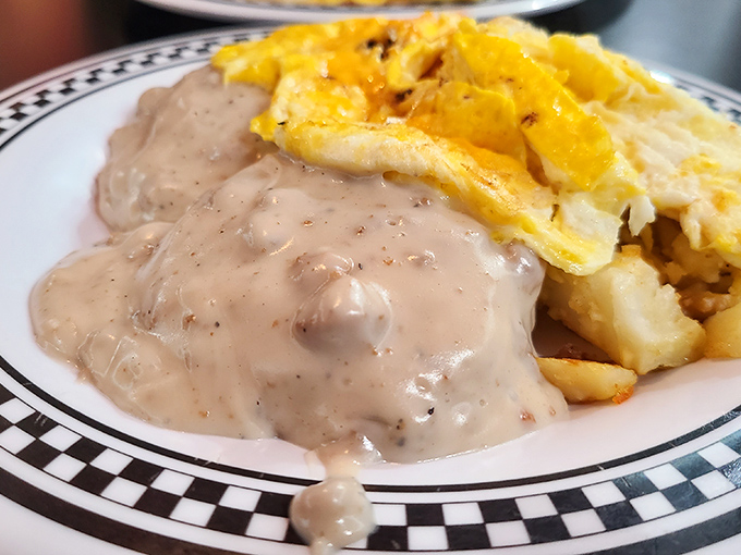 Biscuits and gravy: Southern comfort meets Maryland morning. This plate doesn't just speak to your hunger&mdash;it writes it poetry.