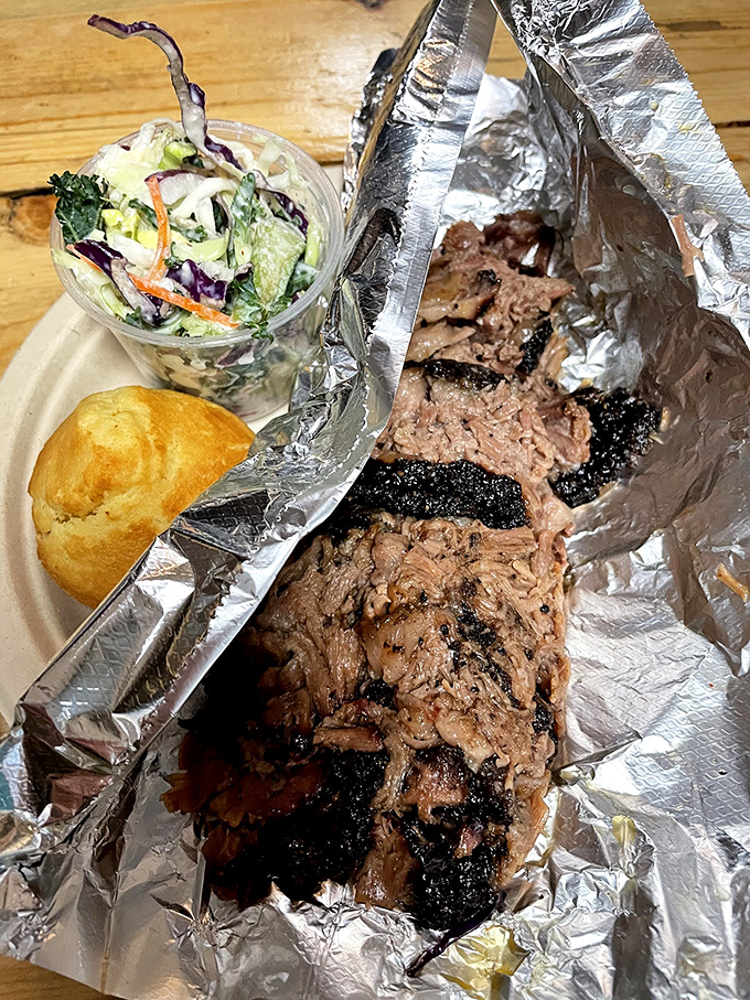 Brisket so tender it practically surrenders at the sight of your fork. That bark is the barbecue equivalent of winning the lottery.