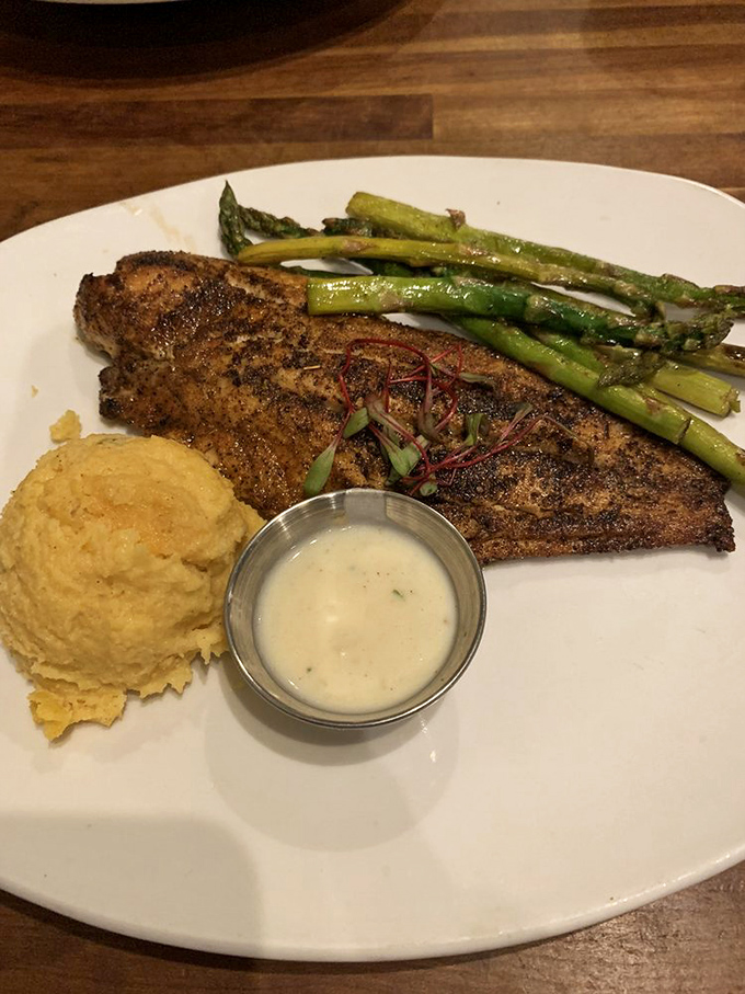 Blackened redfish that's spiced just right, with asparagus standing at attention and sweet potato mash that could make a Southerner weep with joy.