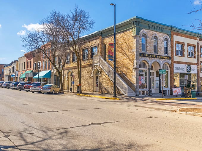 The Scriver Building anchors Division Street with golden limestone walls that practically glow in the afternoon sun&mdash;architectural eye candy at its finest.