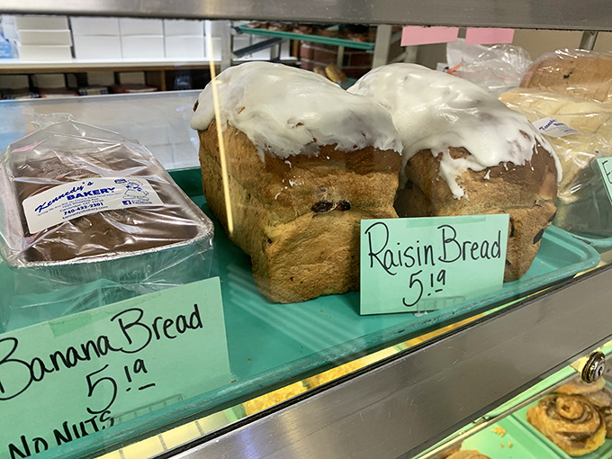 Raisin bread and banana bread sitting side by side like old friends, both generously topped and ready to make your morning infinitely better.