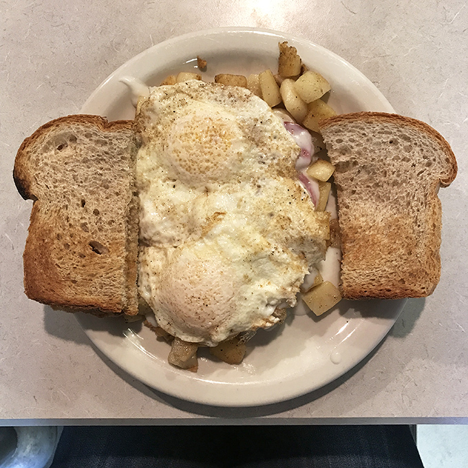 Breakfast nirvana: eggs cooked just right, toast standing by for yolk-sopping duty, and home fries that could make a potato proud.