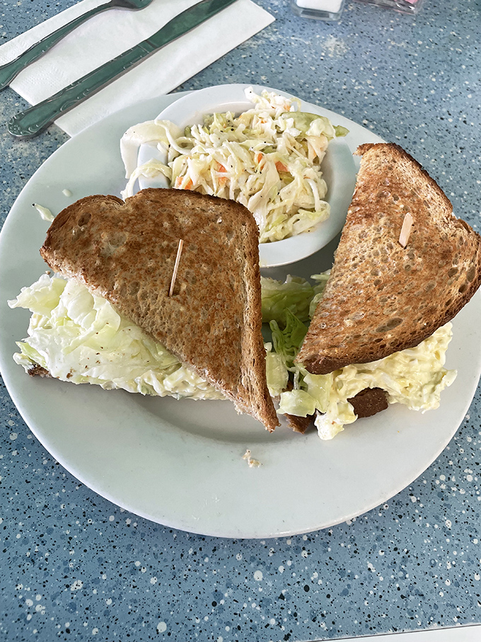 The humble egg sandwich elevated to art form. That perfectly toasted bread and generous filling make this the breakfast MVP.