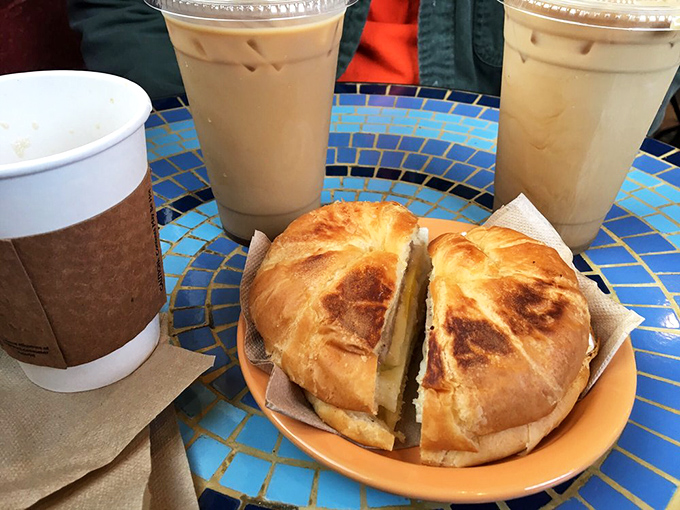 Breakfast sandwich perfection on a golden croissant&mdash;proof that mornings don't have to be awful if you start them with butter-laden carbs and coffee.