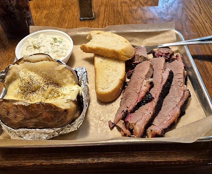 Brisket sliced so perfectly it could make a Texas pitmaster weep with joy. That smoke ring is basically a halo of flavor.