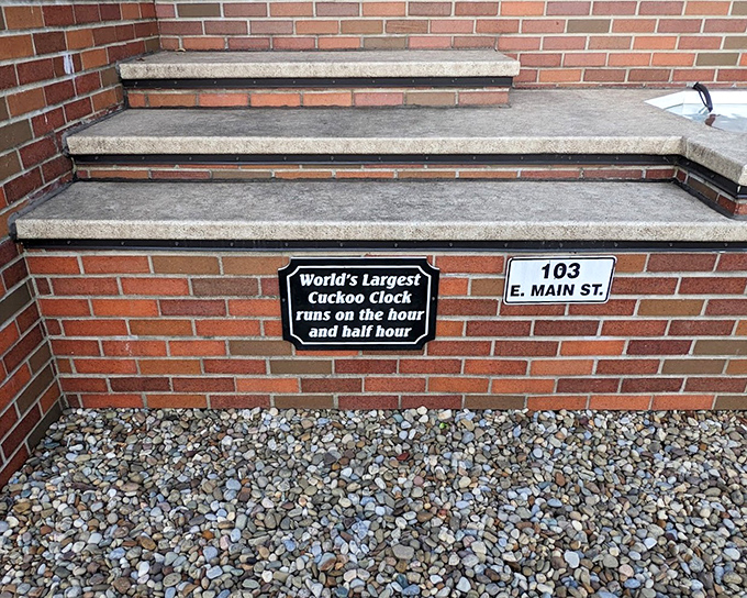 A simple sign reveals the clock's performance schedule, proving that even the world's largest cuckoo needs an occasional winter break.