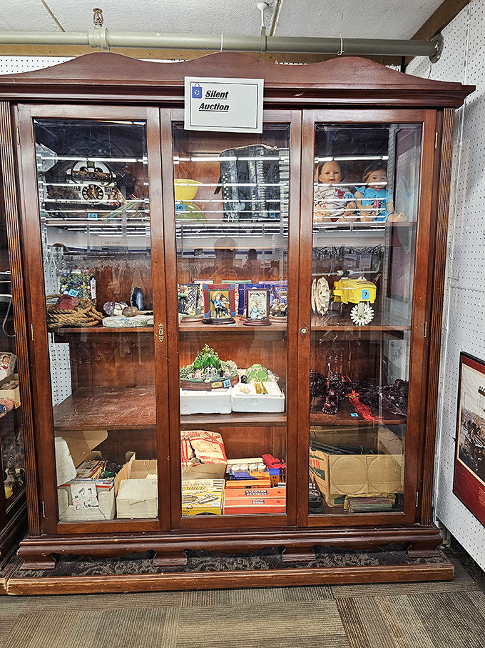 This silent auction cabinet showcases the cream of the crop. Special finds under glass, where the thrill of bidding adds extra excitement to the hunt.