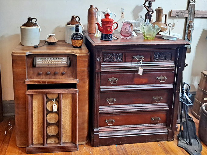 This nostalgic corner pairs a vintage wooden radio cabinet with an ornately carved chest of drawers&mdash;technology meets craftsmanship.