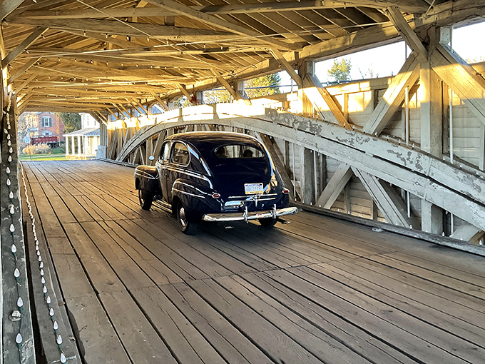 Cars still traverse this historic span, proving that good design never goes out of style, unlike bell-bottoms.