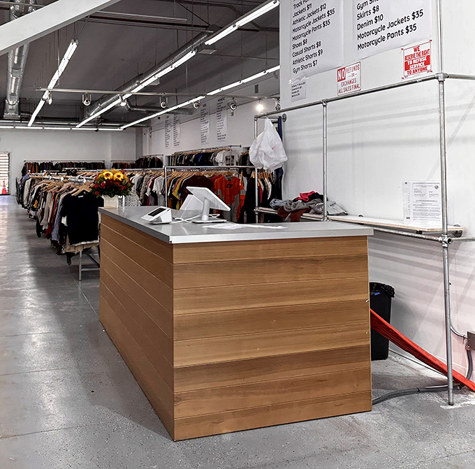 The checkout area&mdash;where dreams are tallied and wallets breathe sighs of relief. That wooden counter has witnessed countless victory purchases.