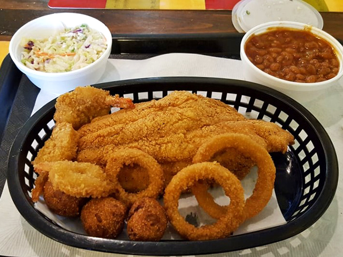Crispy catfish, creamy slaw, and beans that have clearly been simmering since breakfast. This isn't just a meal, it's a Southern symphony.