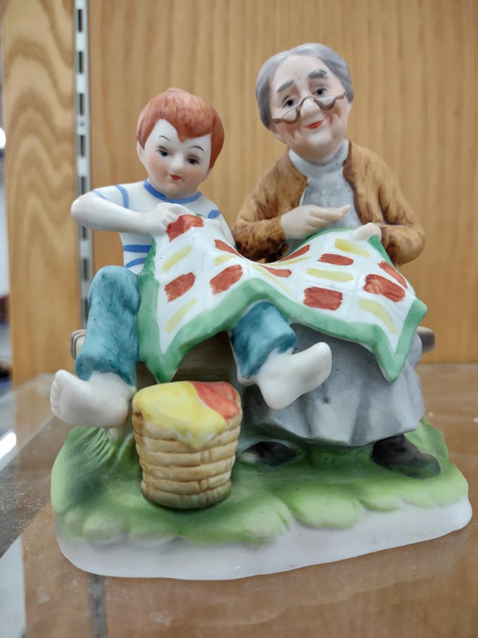 Porcelain figurines tell stories from another era. This quilting duo might have once graced Grandma's curio cabinet before finding their way here.