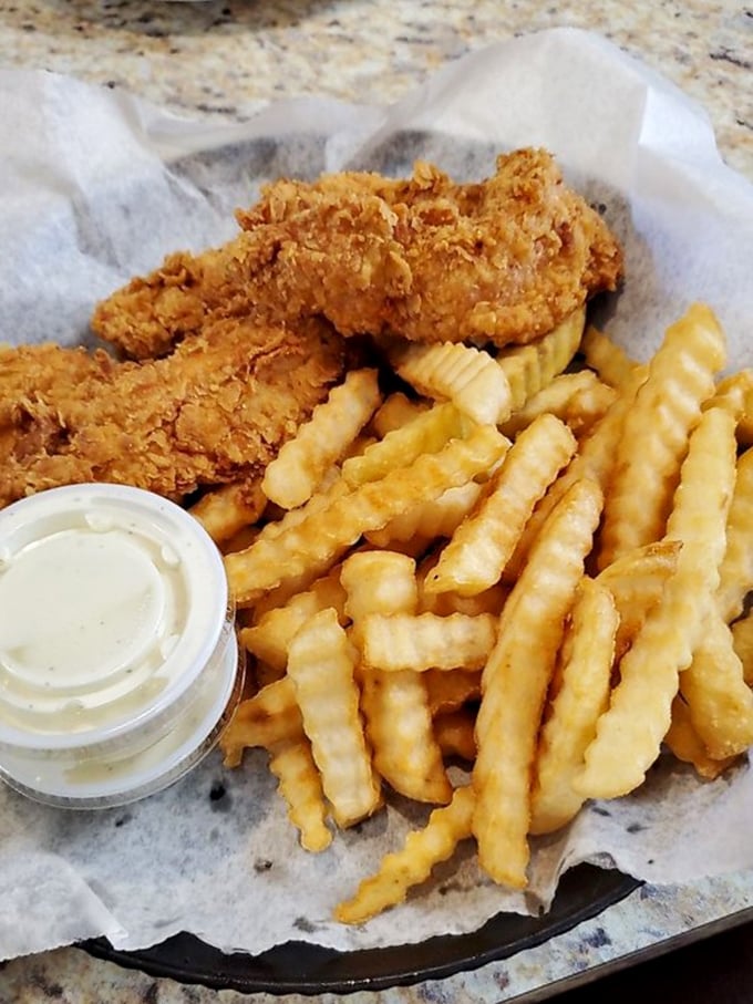 Chicken tenders that actually deserve the name "tender," with a crunch that announces itself three tables away. Fast food wishes it could compete.
