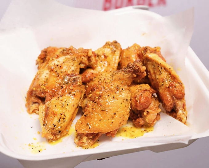These wings aren't just fried; they're transformed into crispy, seasoned perfection. The kind that makes you lick your fingers despite your mother's voice in your head.