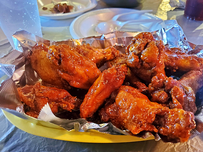 These aren't just wings&mdash;they're flavor delivery vehicles, glistening with sauce that demands both napkins and respect. Finger-licking isn't just allowed, it's mandatory.