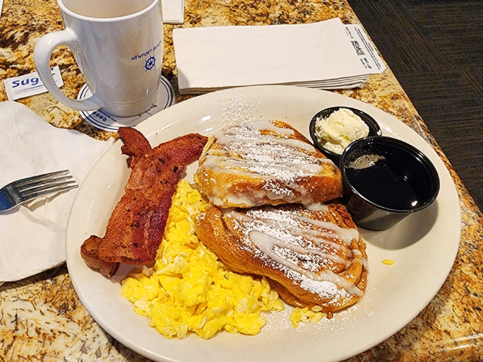French toast that makes you question every other breakfast decision you've ever made&mdash;dusted with powdered sugar and served with a side of morning bliss.