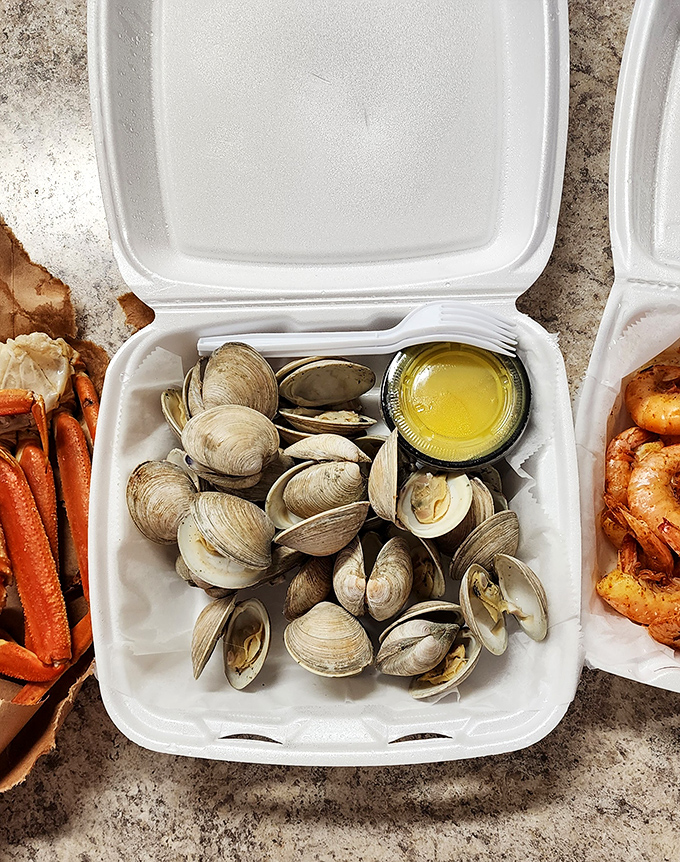 These aren't just clams; they're little oceanic treasures waiting for a squeeze of lemon and a moment of silence before the first bite.