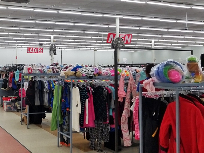 Department store organization meets garage sale prices. The "Men" and "Ladies" signs help prevent wardrobe identity crises.