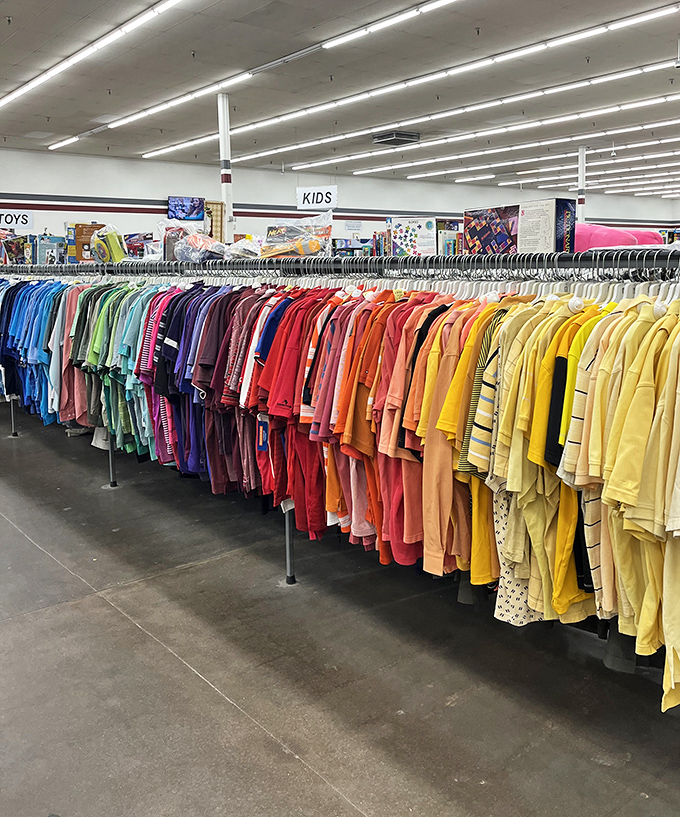 The rainbow of clothing racks at Red White & Blue isn't just organized&mdash;it's a color-coded treasure map leading straight to your next favorite shirt.
