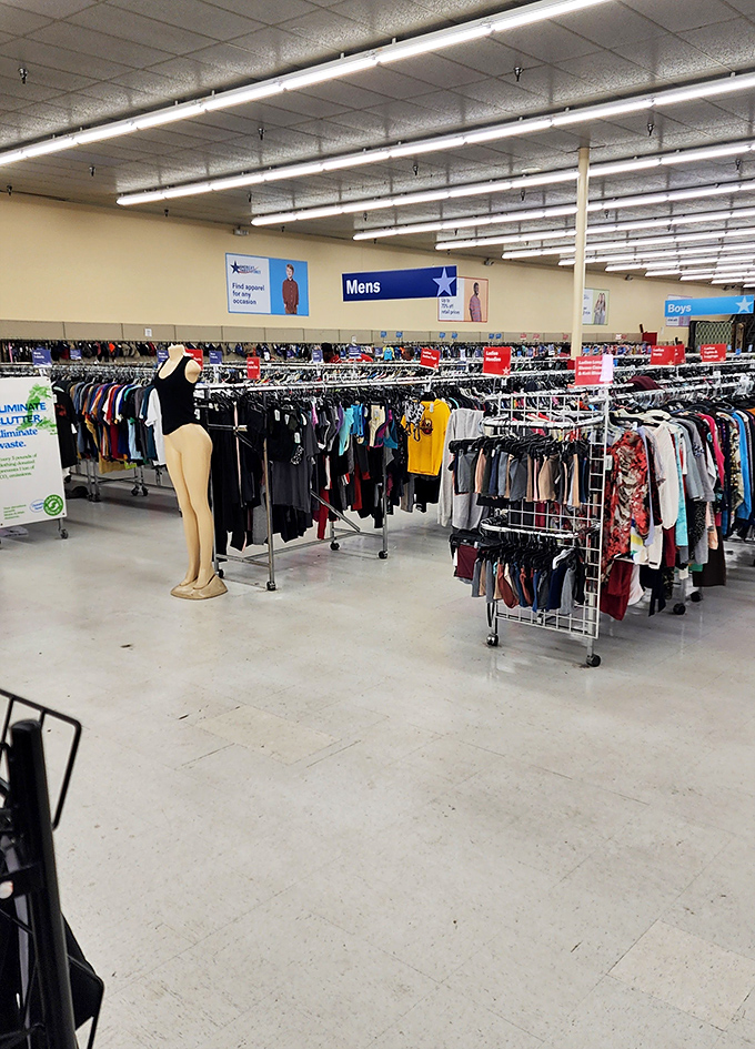 The men's section stands ready for inspection, complete with mannequin sentinel guarding an impressive array of second-hand style options.