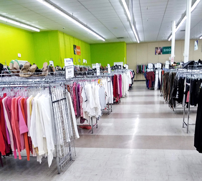 Bright lime green walls frame an impressive clothing selection that puts some department stores to shame. The thrill of the hunt is real.