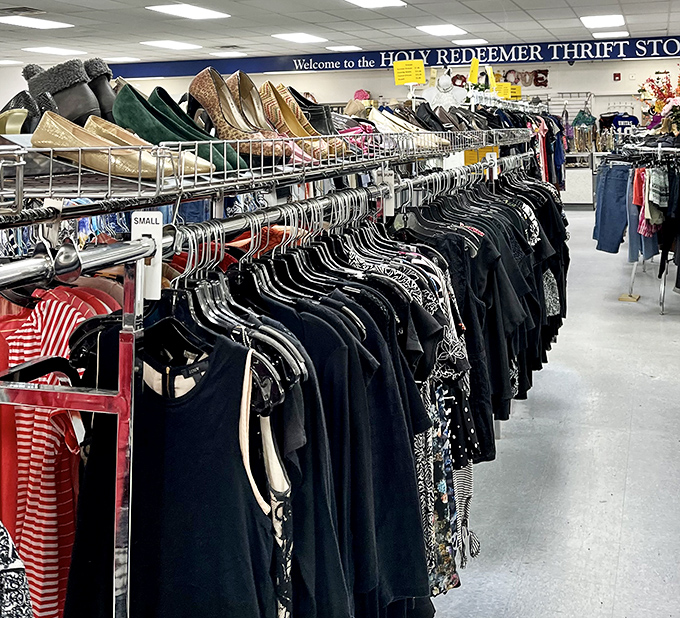 Clothing racks stretch toward the horizon like a fashion time machine. That perfect black dress is hiding somewhere between decades.