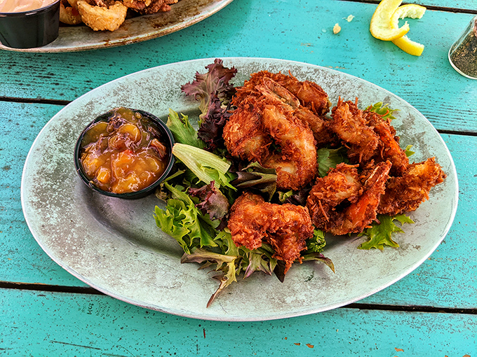 Golden-fried coconut shrimp with just the right crunch, served with a tropical chutney that transports your taste buds straight to the islands.
