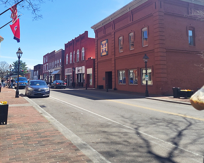 Colorful quilt squares adorn buildings along Main Street, stitching together the town's artistic heritage with its architectural treasures.