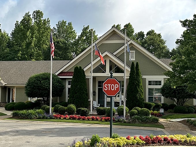 Security meets serenity at the community entrance, where the landscaping is so perfect it looks like it's auditioning for a magazine cover.